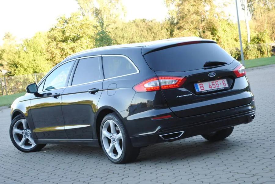 Black Ford Mondeo 2015 in Riga, with an engine capacity of 2.00 L and mileage of 240 thousand km for 8990 €, photo 4 on AUTOMOTO.COM.LV