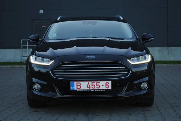 Black Ford Mondeo 2015 in Riga, with an engine capacity of 2.00 L and mileage of 240 thousand km for 8990 €, photo 5 on AUTOMOTO.COM.LV