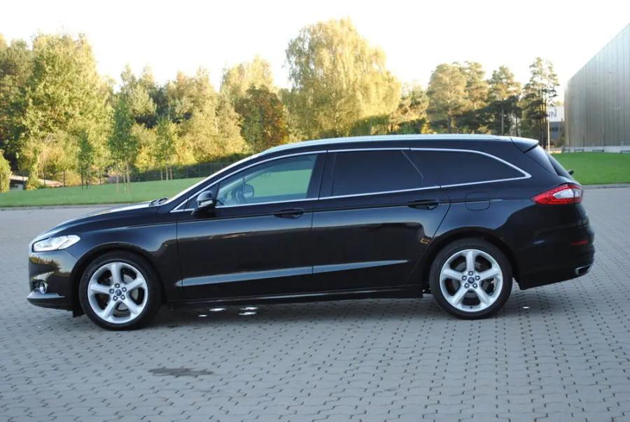 Black Ford Mondeo 2015 in Riga, with an engine capacity of 2.00 L and mileage of 240 thousand km for 8990 €, photo 7 on AUTOMOTO.COM.LV