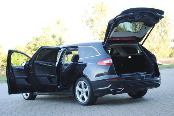 Black Ford Mondeo 2015 in Riga, with an engine capacity of 2.00 L and mileage of 240 thousand km for 8990 €, photo 9 on AUTOMOTO.COM.LV