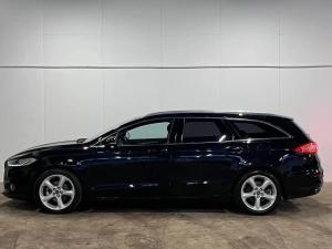 Black Ford Mondeo 2015 in Jurmala, with an engine capacity of 2.00 L and mileage of 284 thousand km for 8995 €, photo 5 on AUTOMOTO.COM.LV