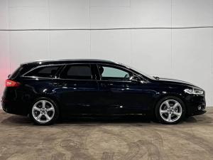 Black Ford Mondeo 2015 in Jurmala, with an engine capacity of 2.00 L and mileage of 284 thousand km for 8995 €, photo 10 on AUTOMOTO.COM.LV