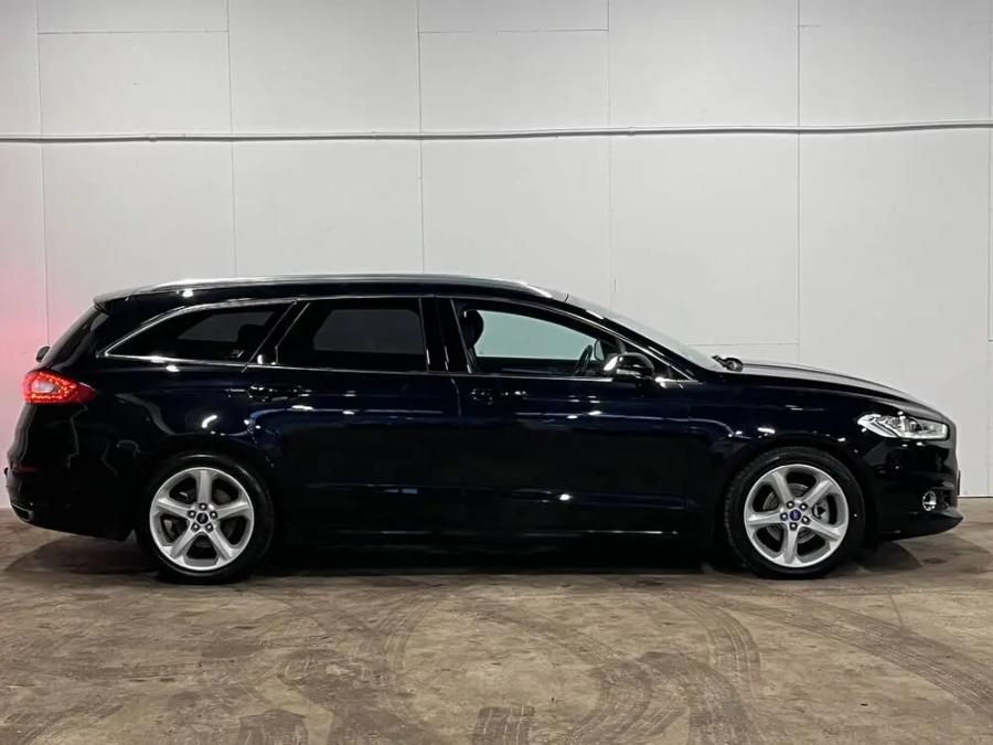 Black Ford Mondeo 2015 in Jurmala, with an engine capacity of 2.00 L and mileage of 284 thousand km for 8995 €, photo 10 on AUTOMOTO.COM.LV