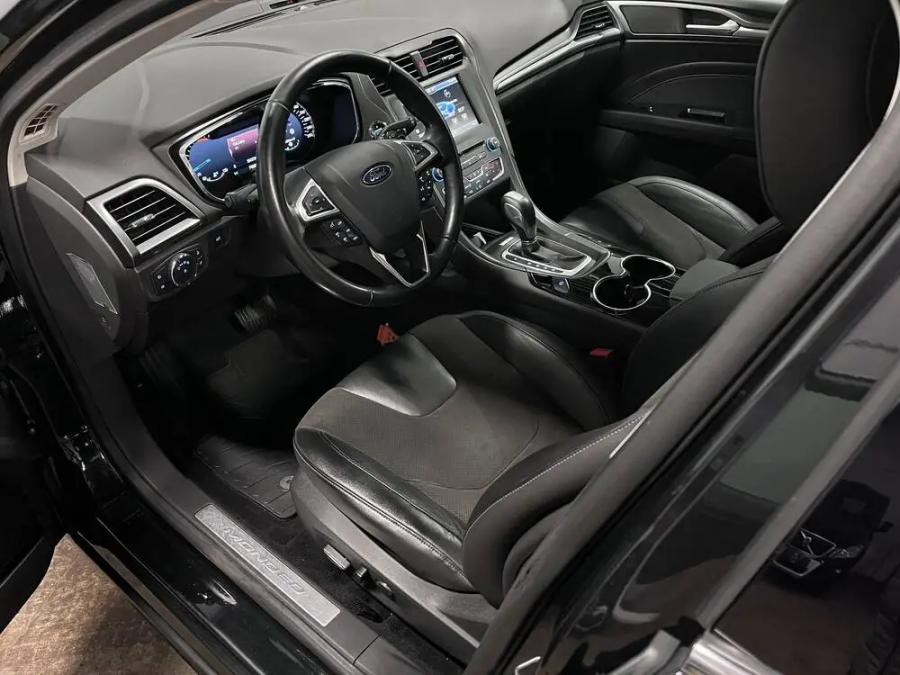 Black Ford Mondeo 2015 in Jurmala, with an engine capacity of 2.00 L and mileage of 284 thousand km for 8995 €, photo 14 on AUTOMOTO.COM.LV