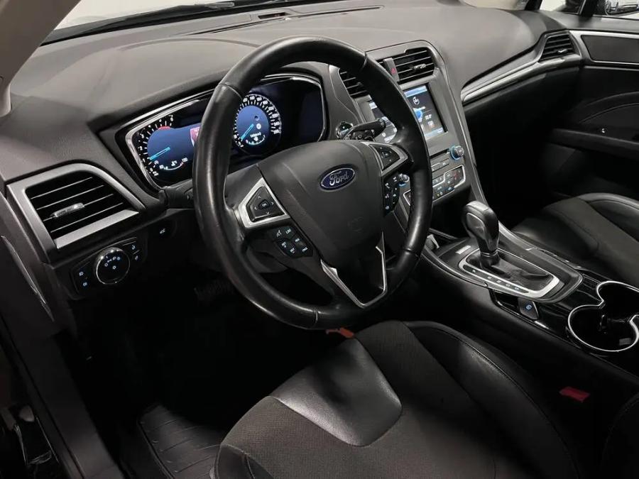 Black Ford Mondeo 2015 in Jurmala, with an engine capacity of 2.00 L and mileage of 284 thousand km for 8995 €, photo 15 on AUTOMOTO.COM.LV