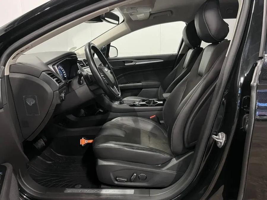 Black Ford Mondeo 2015 in Jurmala, with an engine capacity of 2.00 L and mileage of 284 thousand km for 8995 €, photo 18 on AUTOMOTO.COM.LV