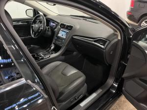 Black Ford Mondeo 2015 in Jurmala, with an engine capacity of 2.00 L and mileage of 284 thousand km for 8995 €, photo 19 on AUTOMOTO.COM.LV