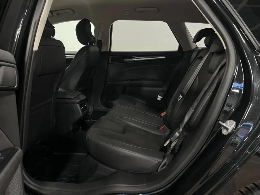Black Ford Mondeo 2015 in Jurmala, with an engine capacity of 2.00 L and mileage of 284 thousand km for 8995 €, photo 24 on AUTOMOTO.COM.LV