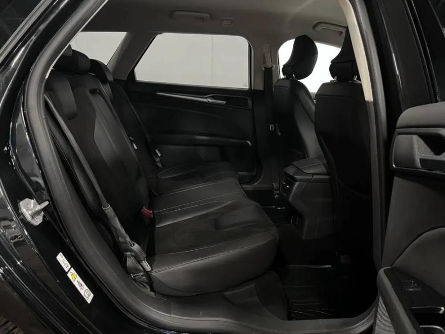 Black Ford Mondeo 2015 in Jurmala, with an engine capacity of 2.00 L and mileage of 284 thousand km for 8995 €, photo 25 on AUTOMOTO.COM.LV