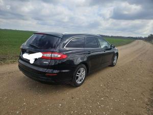 Black Ford Mondeo 2015 in Kaunas, with an engine capacity of 1.50 L and mileage of 240 thousand km for 4200 €, photo 3 on AUTOMOTO.COM.LV