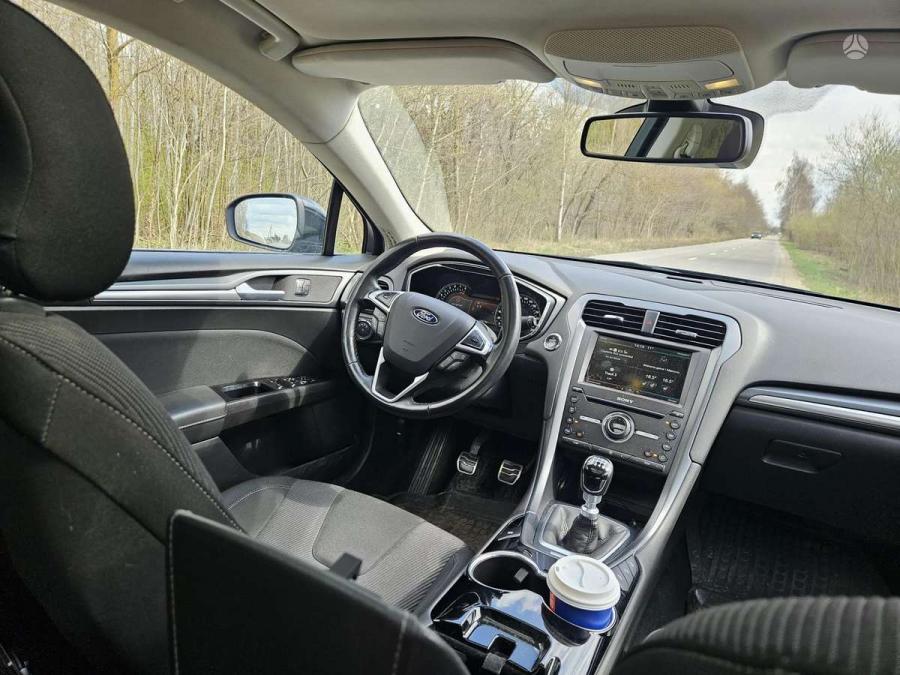 Black Ford Mondeo 2015 in Kaunas, with an engine capacity of 1.50 L and mileage of 240 thousand km for 4200 €, photo 4 on AUTOMOTO.COM.LV