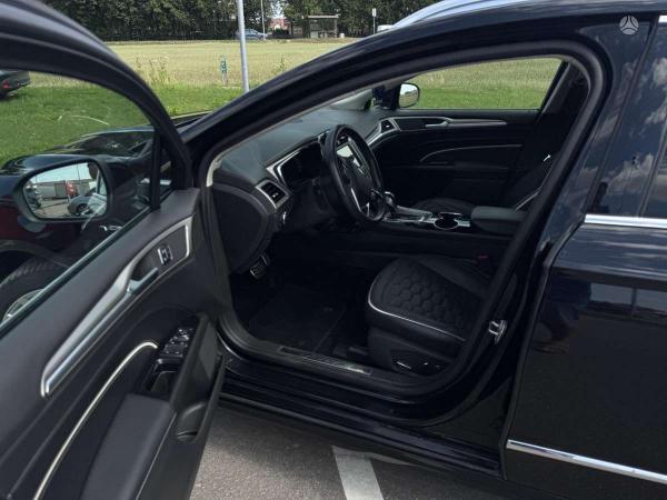 Black Ford Mondeo 2015 in Vilnius, with an engine capacity of 2.00 L and mileage of 227 thousand km for 8000 €, photo 10 on AUTOMOTO.COM.LV