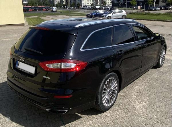 Black Ford Mondeo 2015 in Vilnius, with an engine capacity of 2.00 L and mileage of 246 thousand km for 7999 €, photo 4 on AUTOMOTO.COM.LV