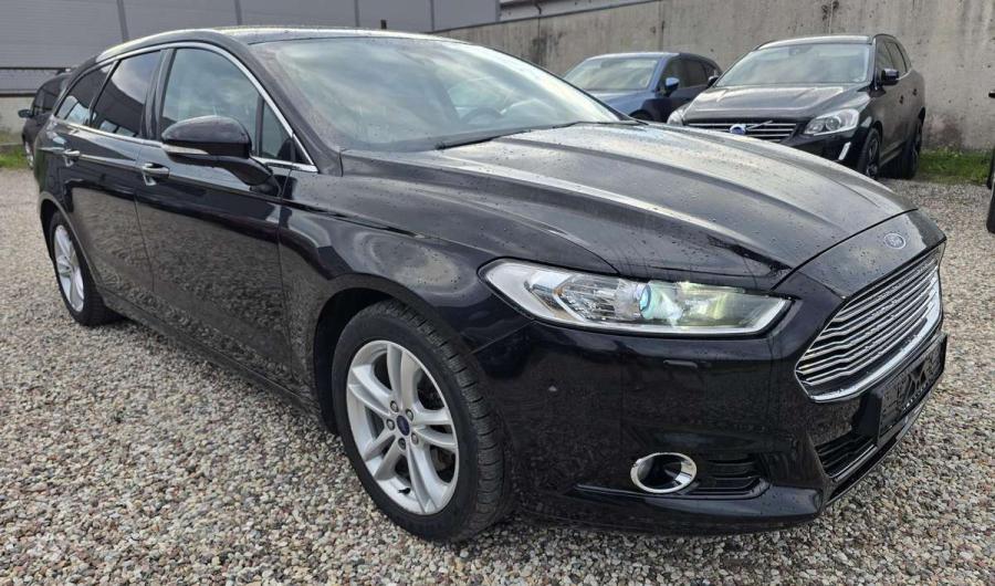 Black Ford Mondeo 2015 in Kaunas, with an engine capacity of 2.00 L and mileage of 262 thousand km for 6999 €, photo 1 on AUTOMOTO.COM.LV