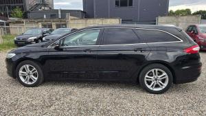 Black Ford Mondeo 2015 in Kaunas, with an engine capacity of 2.00 L and mileage of 262 thousand km for 6999 €, photo 5 on AUTOMOTO.COM.LV
