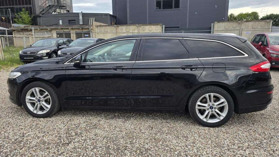 Black Ford Mondeo 2015 in Kaunas, with an engine capacity of 2.00 L and mileage of 262 thousand km for 6999 €, photo 5 on AUTOMOTO.COM.LV