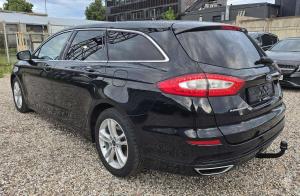 Black Ford Mondeo 2015 in Kaunas, with an engine capacity of 2.00 L and mileage of 262 thousand km for 6999 €, photo 6 on AUTOMOTO.COM.LV