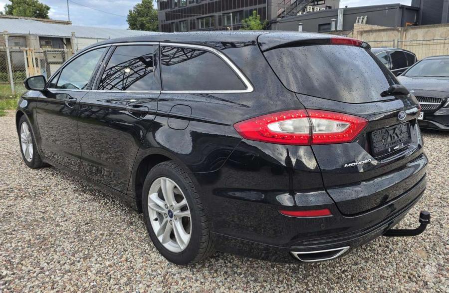 Black Ford Mondeo 2015 in Kaunas, with an engine capacity of 2.00 L and mileage of 262 thousand km for 6999 €, photo 6 on AUTOMOTO.COM.LV