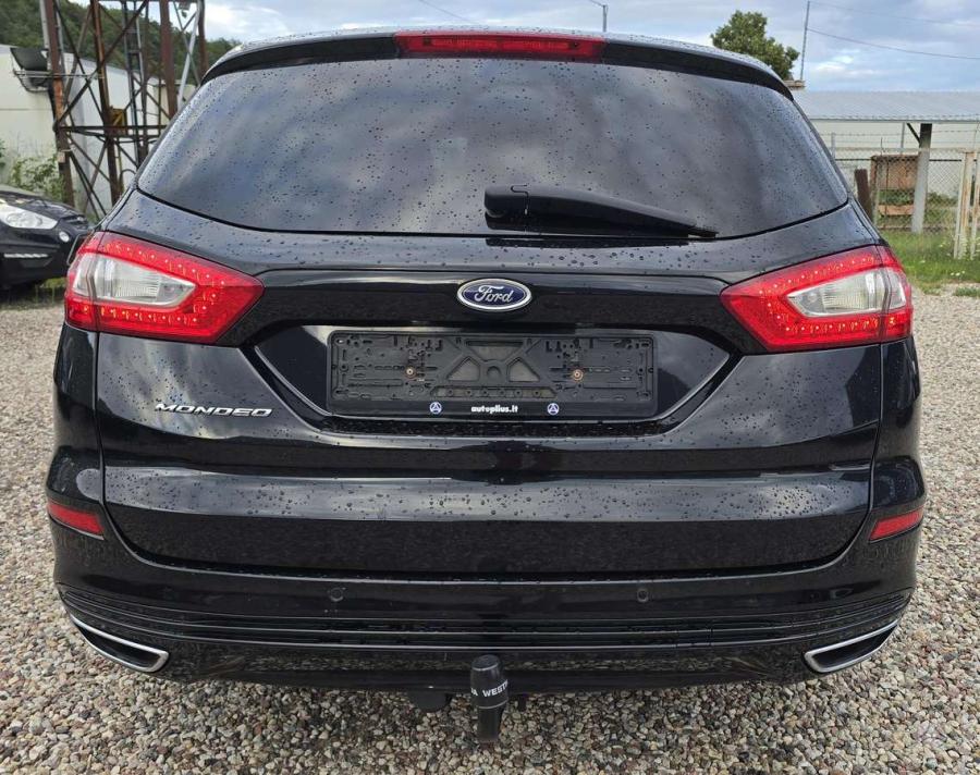 Black Ford Mondeo 2015 in Kaunas, with an engine capacity of 2.00 L and mileage of 262 thousand km for 6999 €, photo 7 on AUTOMOTO.COM.LV