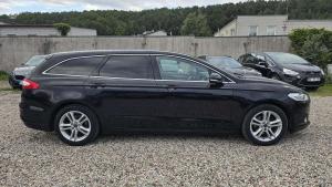 Black Ford Mondeo 2015 in Kaunas, with an engine capacity of 2.00 L and mileage of 262 thousand km for 6999 €, photo 9 on AUTOMOTO.COM.LV