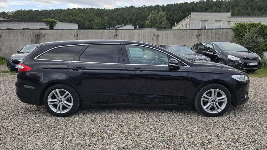 Black Ford Mondeo 2015 in Kaunas, with an engine capacity of 2.00 L and mileage of 262 thousand km for 6999 €, photo 9 on AUTOMOTO.COM.LV