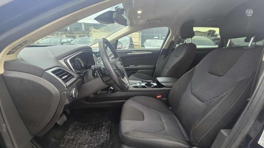 Black Ford Mondeo 2015 in Kaunas, with an engine capacity of 2.00 L and mileage of 262 thousand km for 6999 €, photo 10 on AUTOMOTO.COM.LV