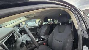 Black Ford Mondeo 2015 in Kaunas, with an engine capacity of 2.00 L and mileage of 262 thousand km for 6999 €, photo 11 on AUTOMOTO.COM.LV