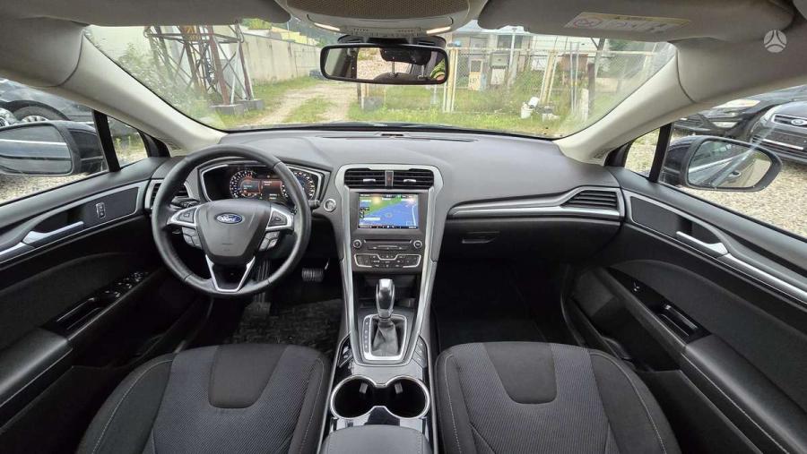 Black Ford Mondeo 2015 in Kaunas, with an engine capacity of 2.00 L and mileage of 262 thousand km for 6999 €, photo 13 on AUTOMOTO.COM.LV
