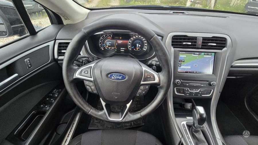 Black Ford Mondeo 2015 in Kaunas, with an engine capacity of 2.00 L and mileage of 262 thousand km for 6999 €, photo 14 on AUTOMOTO.COM.LV