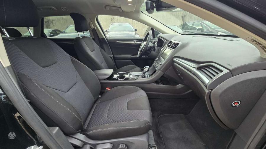 Black Ford Mondeo 2015 in Kaunas, with an engine capacity of 2.00 L and mileage of 262 thousand km for 6999 €, photo 15 on AUTOMOTO.COM.LV