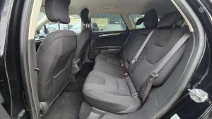Black Ford Mondeo 2015 in Kaunas, with an engine capacity of 2.00 L and mileage of 262 thousand km for 6999 €, photo 19 on AUTOMOTO.COM.LV