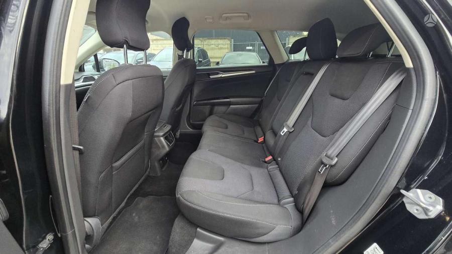 Black Ford Mondeo 2015 in Kaunas, with an engine capacity of 2.00 L and mileage of 262 thousand km for 6999 €, photo 19 on AUTOMOTO.COM.LV
