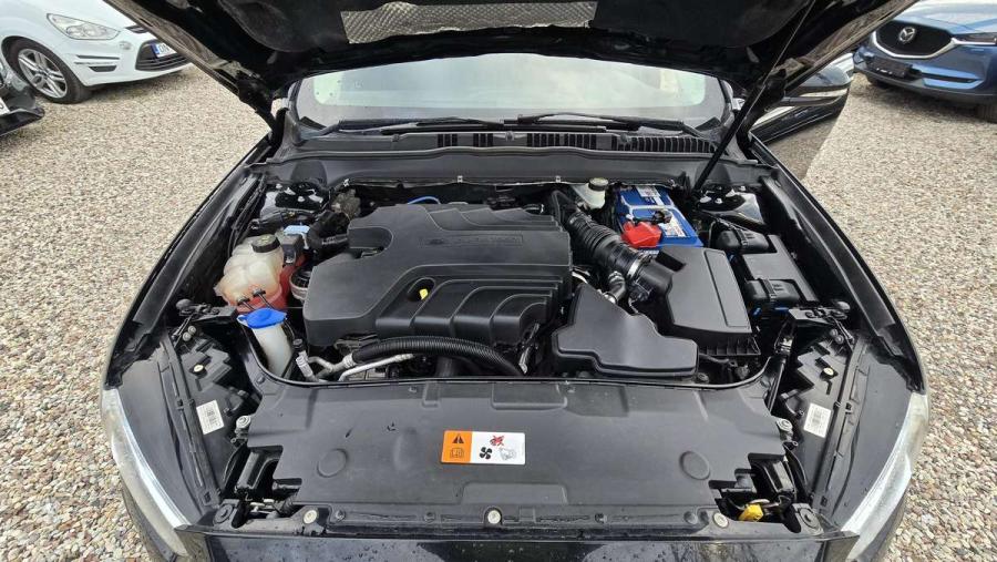 Black Ford Mondeo 2015 in Kaunas, with an engine capacity of 2.00 L and mileage of 262 thousand km for 6999 €, photo 22 on AUTOMOTO.COM.LV
