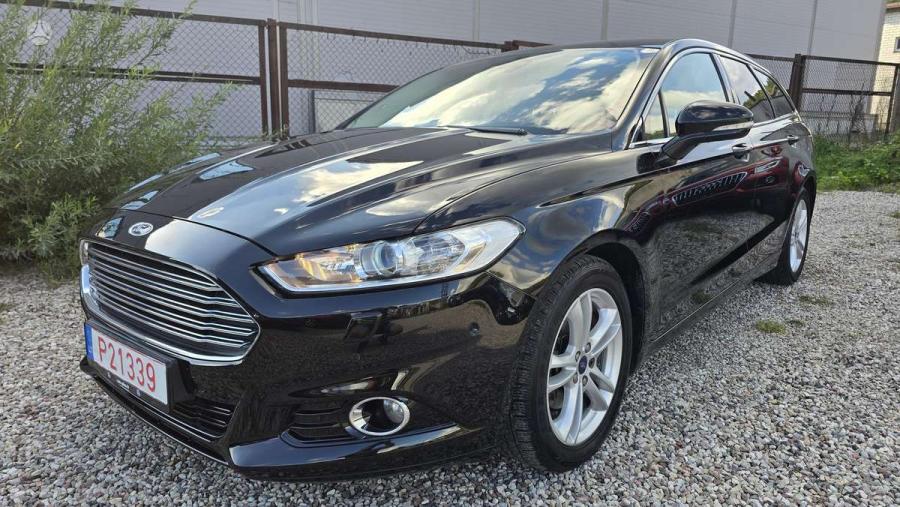 Black Ford Mondeo 2015 in Kaunas, with an engine capacity of 2.00 L and mileage of 262 thousand km for 6999 €, photo 4 on AUTOMOTO.COM.LV