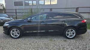 Black Ford Mondeo 2015 in Kaunas, with an engine capacity of 2.00 L and mileage of 262 thousand km for 6999 €, photo 5 on AUTOMOTO.COM.LV