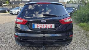 Black Ford Mondeo 2015 in Kaunas, with an engine capacity of 2.00 L and mileage of 262 thousand km for 6999 €, photo 7 on AUTOMOTO.COM.LV