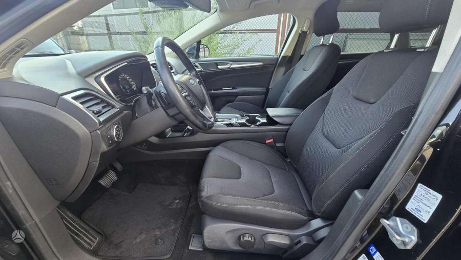Black Ford Mondeo 2015 in Kaunas, with an engine capacity of 2.00 L and mileage of 262 thousand km for 6999 €, photo 9 on AUTOMOTO.COM.LV