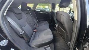 Black Ford Mondeo 2015 in Kaunas, with an engine capacity of 2.00 L and mileage of 262 thousand km for 6999 €, photo 13 on AUTOMOTO.COM.LV