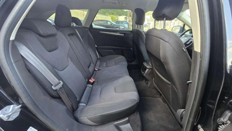 Black Ford Mondeo 2015 in Kaunas, with an engine capacity of 2.00 L and mileage of 262 thousand km for 6999 €, photo 13 on AUTOMOTO.COM.LV