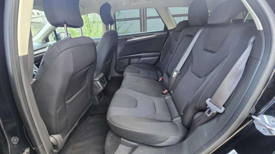 Black Ford Mondeo 2015 in Kaunas, with an engine capacity of 2.00 L and mileage of 262 thousand km for 6999 €, photo 14 on AUTOMOTO.COM.LV
