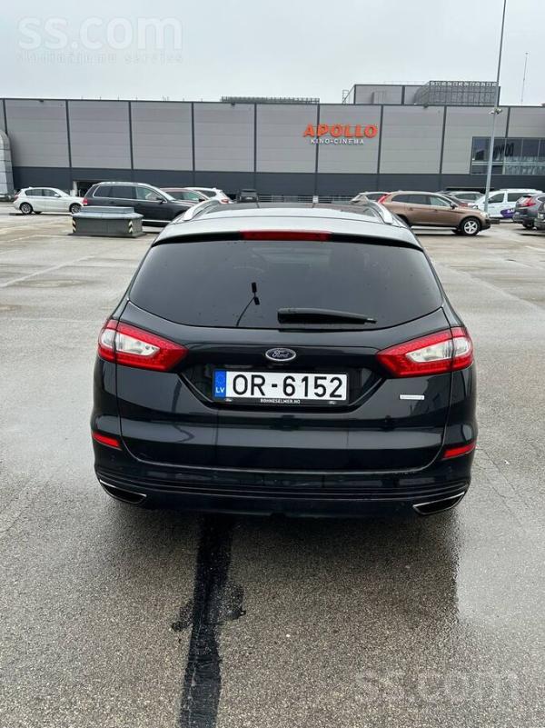 Melns Ford Mondeo 2015 Rīga, ar dzinēja tilpumu 2.00 L un nobraukumu 247 tūkst. km par 6900 €, foto 5 vietnē AUTOMOTO.COM.LV
