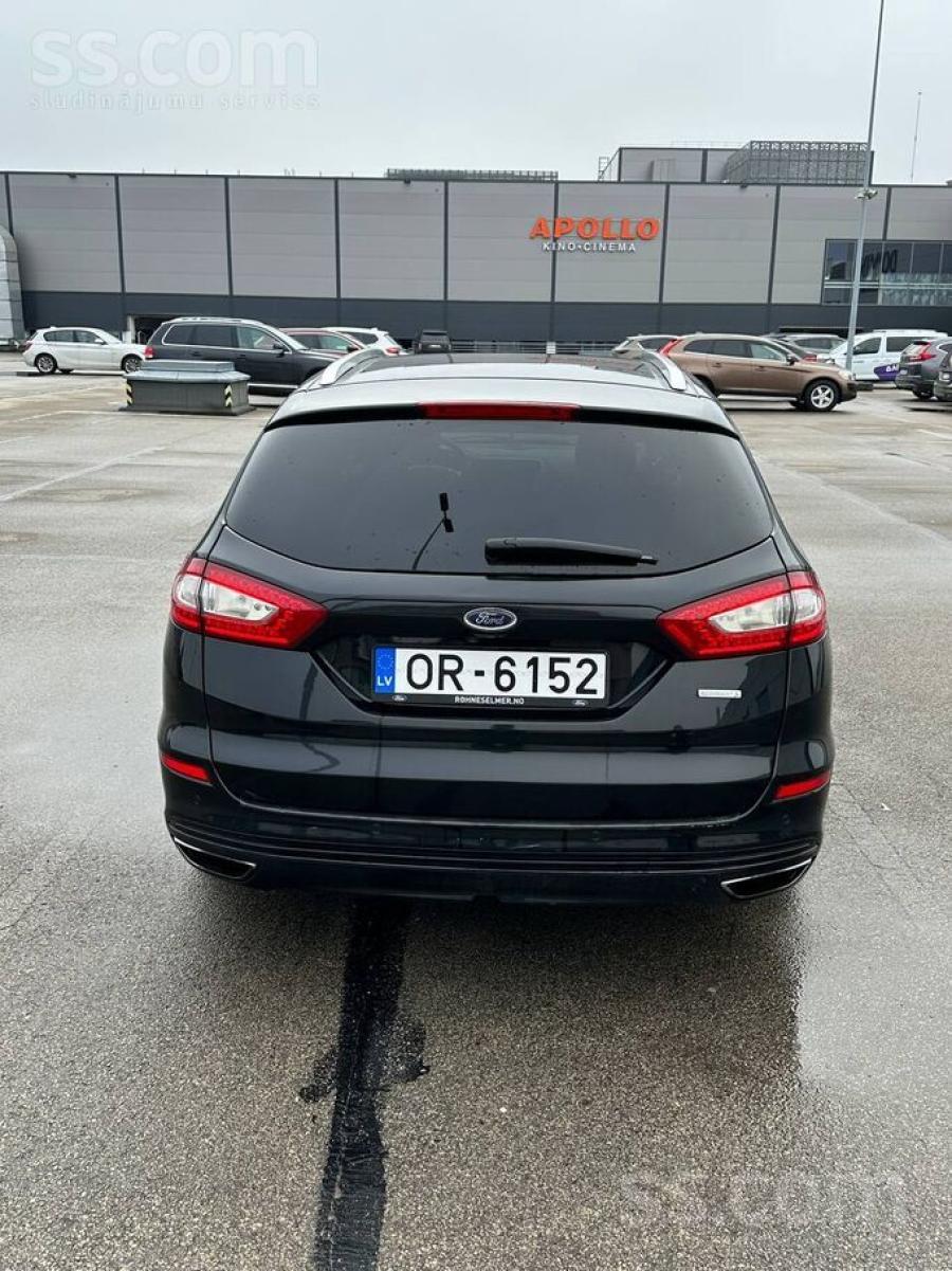 Black Ford Mondeo 2015 in Riga, with an engine capacity of 2.00 L and mileage of 247 thousand km for 6900 €, photo 5 on AUTOMOTO.COM.LV