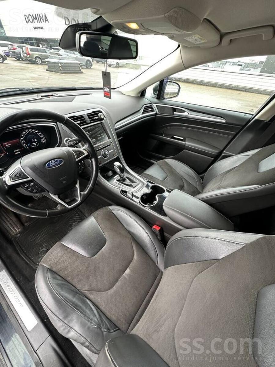 Black Ford Mondeo 2015 in Riga, with an engine capacity of 2.00 L and mileage of 247 thousand km for 6900 €, photo 8 on AUTOMOTO.COM.LV