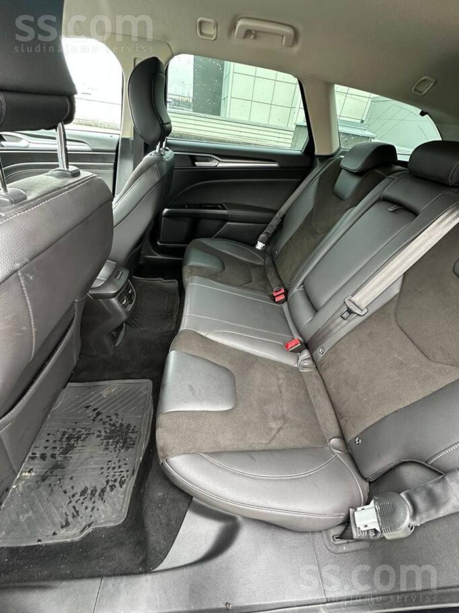 Black Ford Mondeo 2015 in Riga, with an engine capacity of 2.00 L and mileage of 247 thousand km for 6900 €, photo 9 on AUTOMOTO.COM.LV