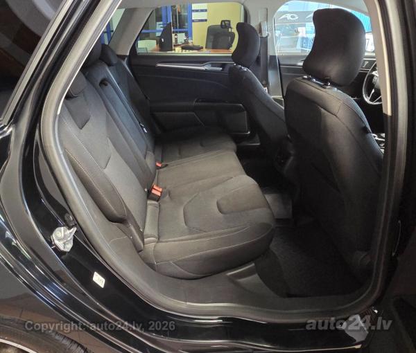 Black Ford Mondeo 2016 in Tartu, with an engine capacity of 2.00 L and mileage of 331 thousand km for 6490 €, photo 8 on AUTOMOTO.COM.LV