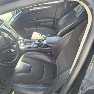 Black Ford Mondeo 2016 in Klaipeda, with an engine capacity of 2.00 L and mileage of 375 thousand km for 5700 €, photo 7 on AUTOMOTO.COM.LV