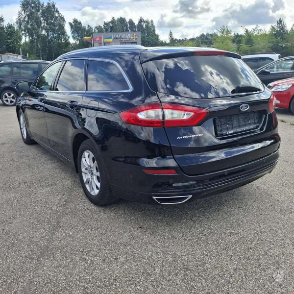 Black Ford Mondeo 2016 in Utena, with an engine capacity of 2.00 L and mileage of 230 thousand km for 6900 €, photo 4 on AUTOMOTO.COM.LV