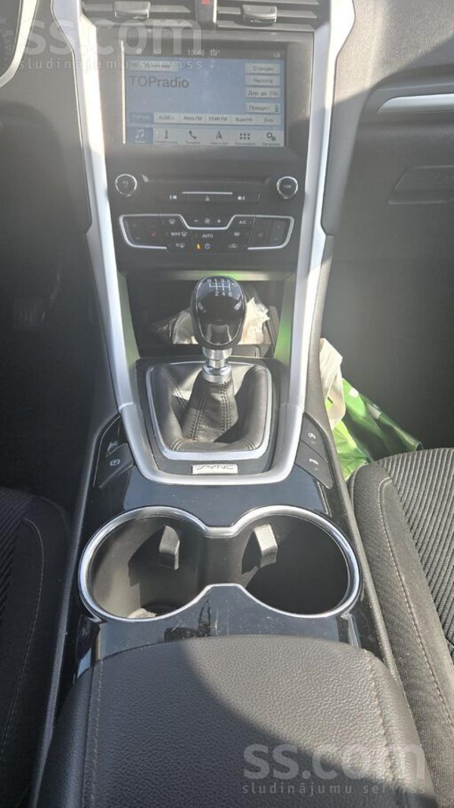 Black Ford Mondeo 2016 in Daugavpils, with an engine capacity of 1.50 L and mileage of 240 thousand km for 6900 €, photo 12 on AUTOMOTO.COM.LV