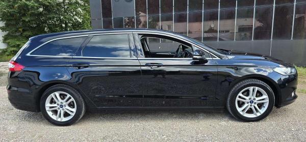 Ford Mondeo 2016 in Kaunas on AUTOMOTO.COM.LV Black Ford Mondeo 2016 in Kaunas, with an engine capacity of 2.00 L and mileage of 254 thousand km for 7250 €, photo 5 on AUTOMOTO.COM.LV