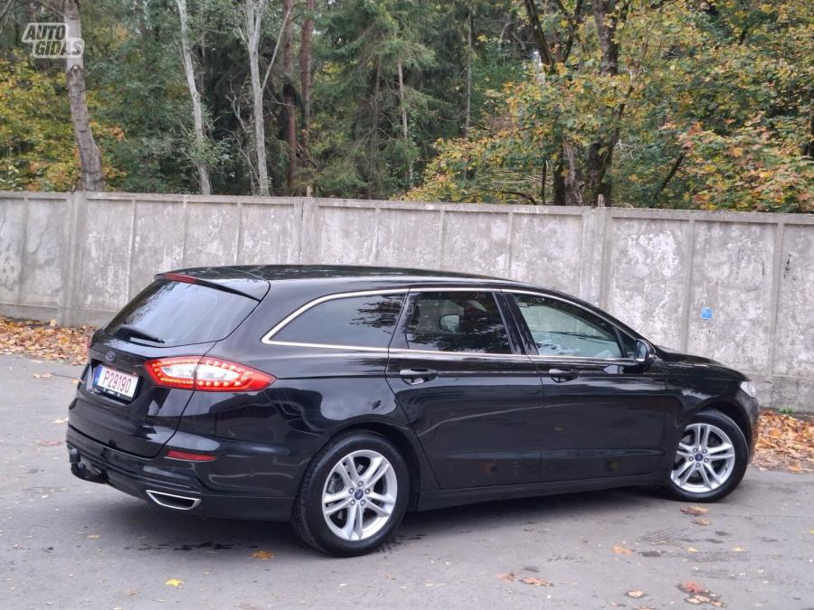 Black Ford Mondeo 2016 in Vilnius, with an engine capacity of 2.00 L and mileage of 266 thousand km for 6700 €, photo 3 on AUTOMOTO.COM.LV